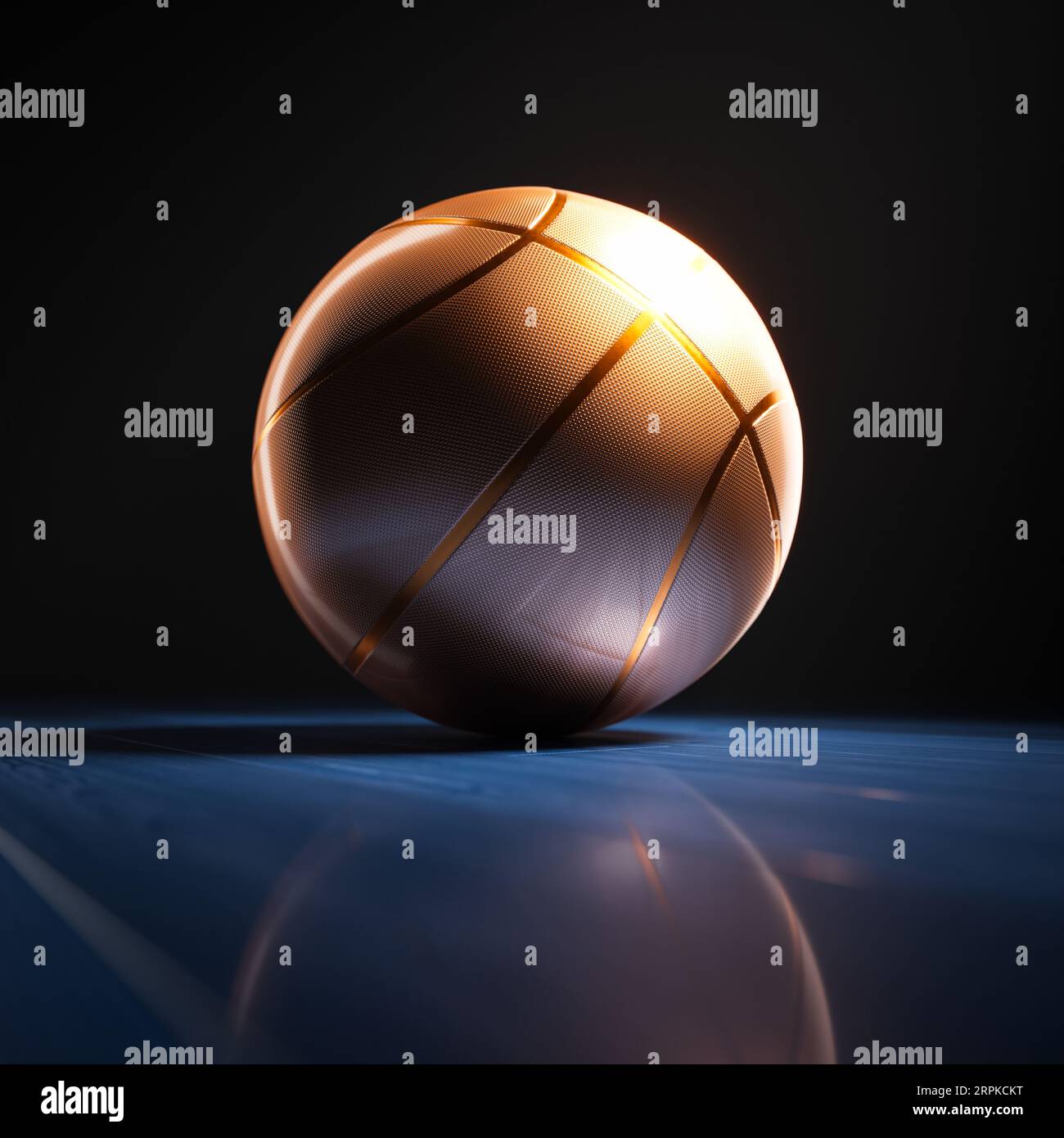 Close-up view at a golden ball on the blue, shiny, foggy basketball ...