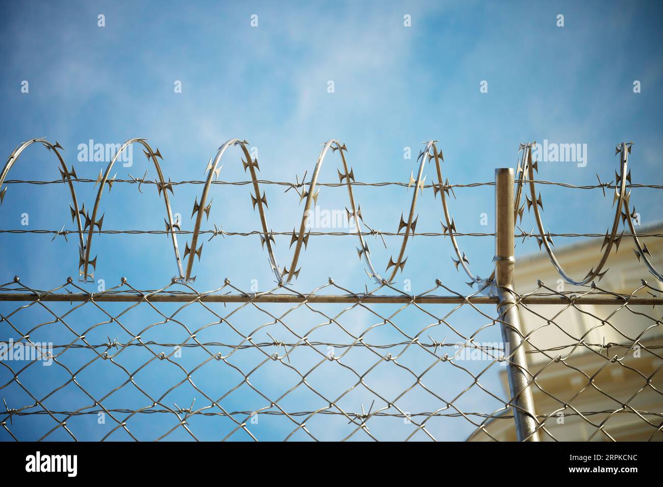 Prisoners behind fence hi-res stock photography and images - Alamy