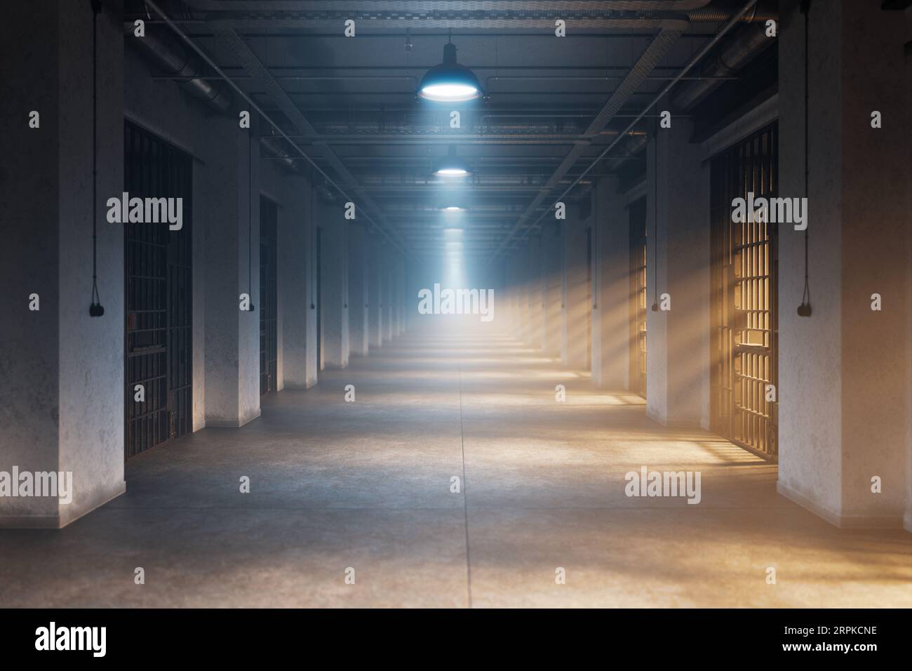 A dark corridor of jail with light shining through small windows in ...