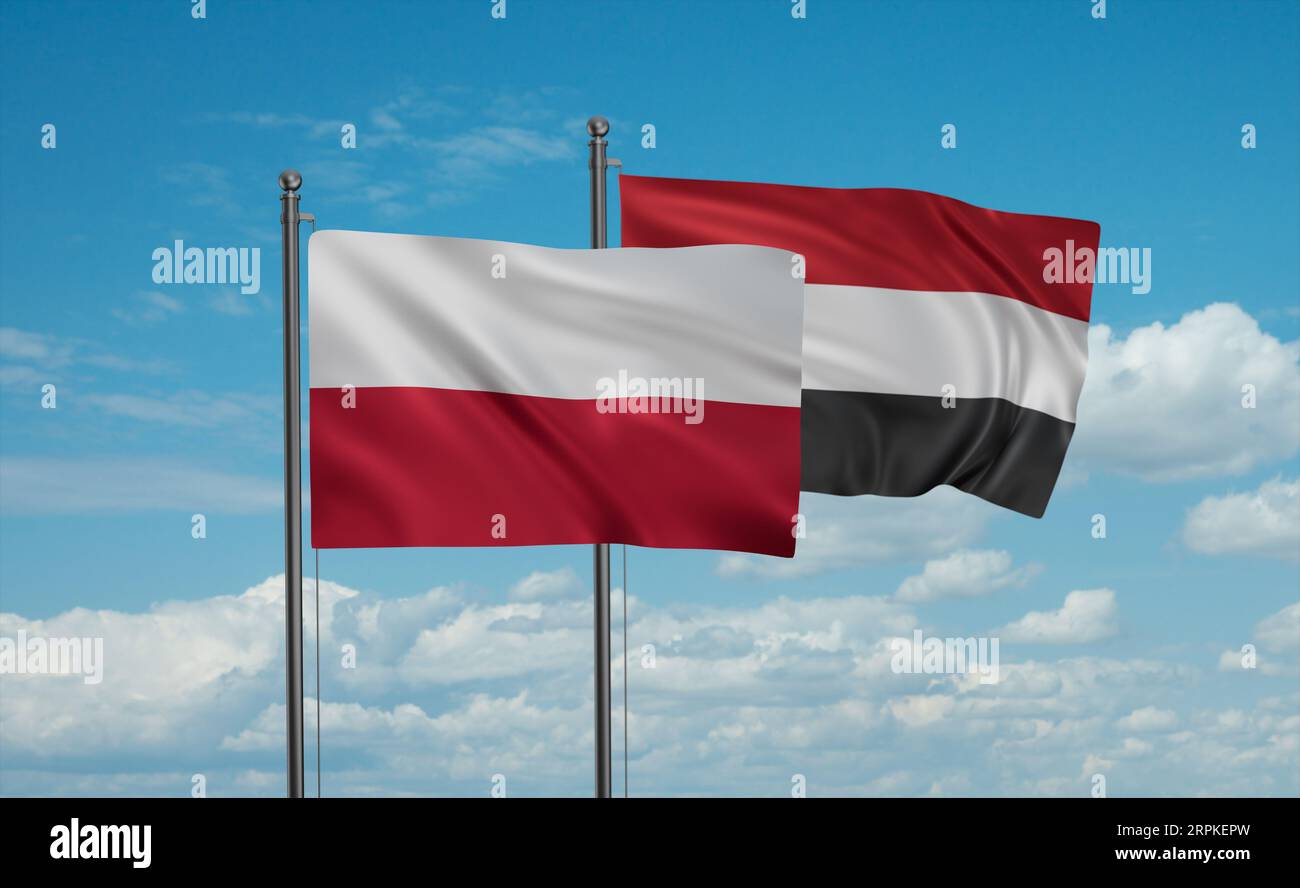 Yemen and Poland flag waving together in the wind on blue sky, two ...