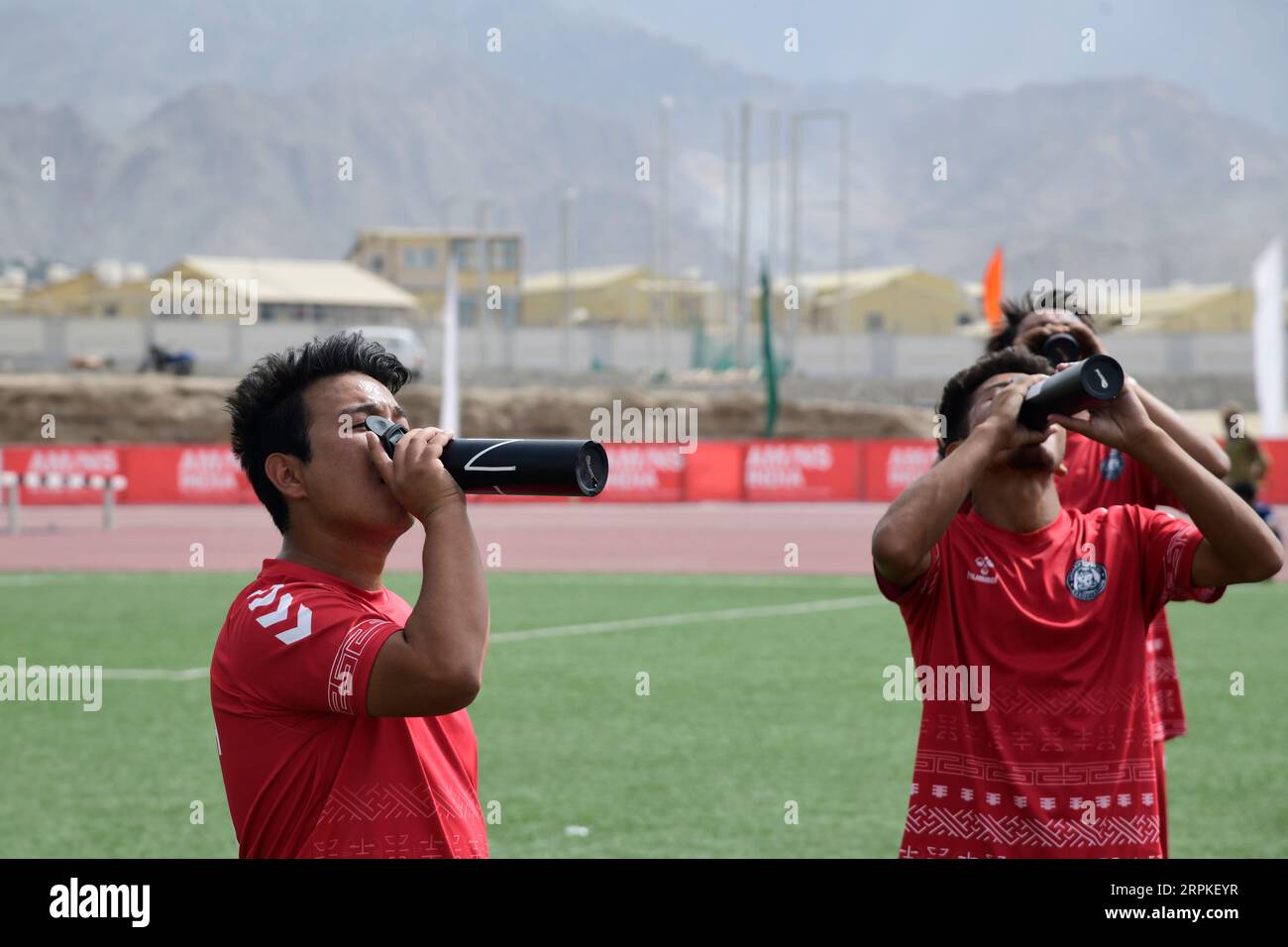 Players drink water during “climate cup” a first of its kind “climate ...