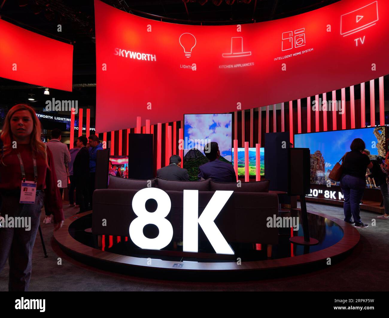 200109 -- LAS VEGAS, Jan. 9, 2020 -- Visitors watch Skyworth 8K TVs at the 2020 Consumer ...