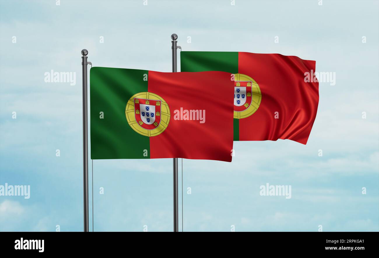 Two Portugal flags waving together in the wind on blue sky, two country ...