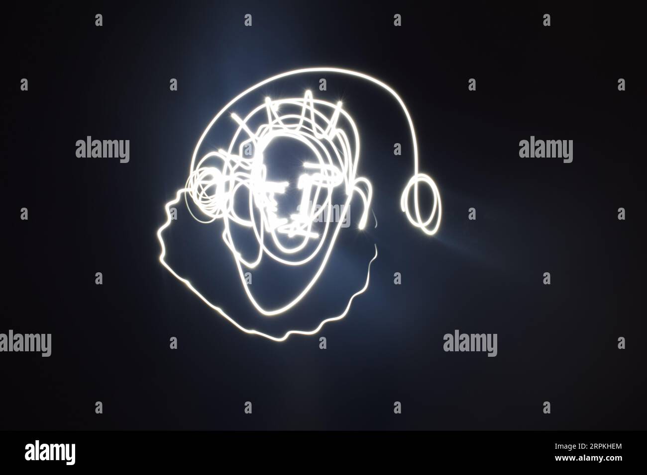 Neon Script Sign light drawing on Black Background Stock Photo - Alamy