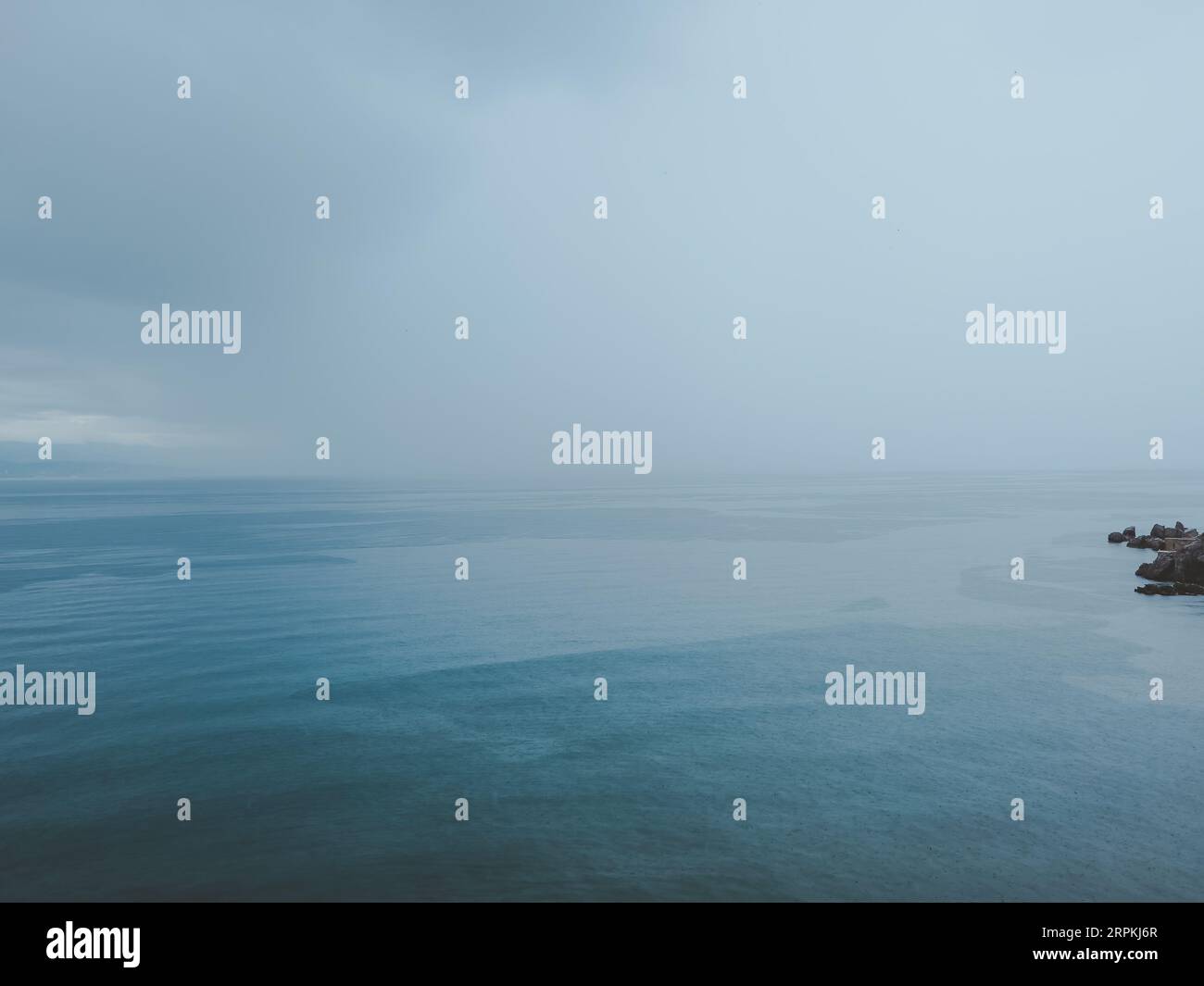 Adriatic sea shoreline during summer tempest shower rain, minimalistic ...