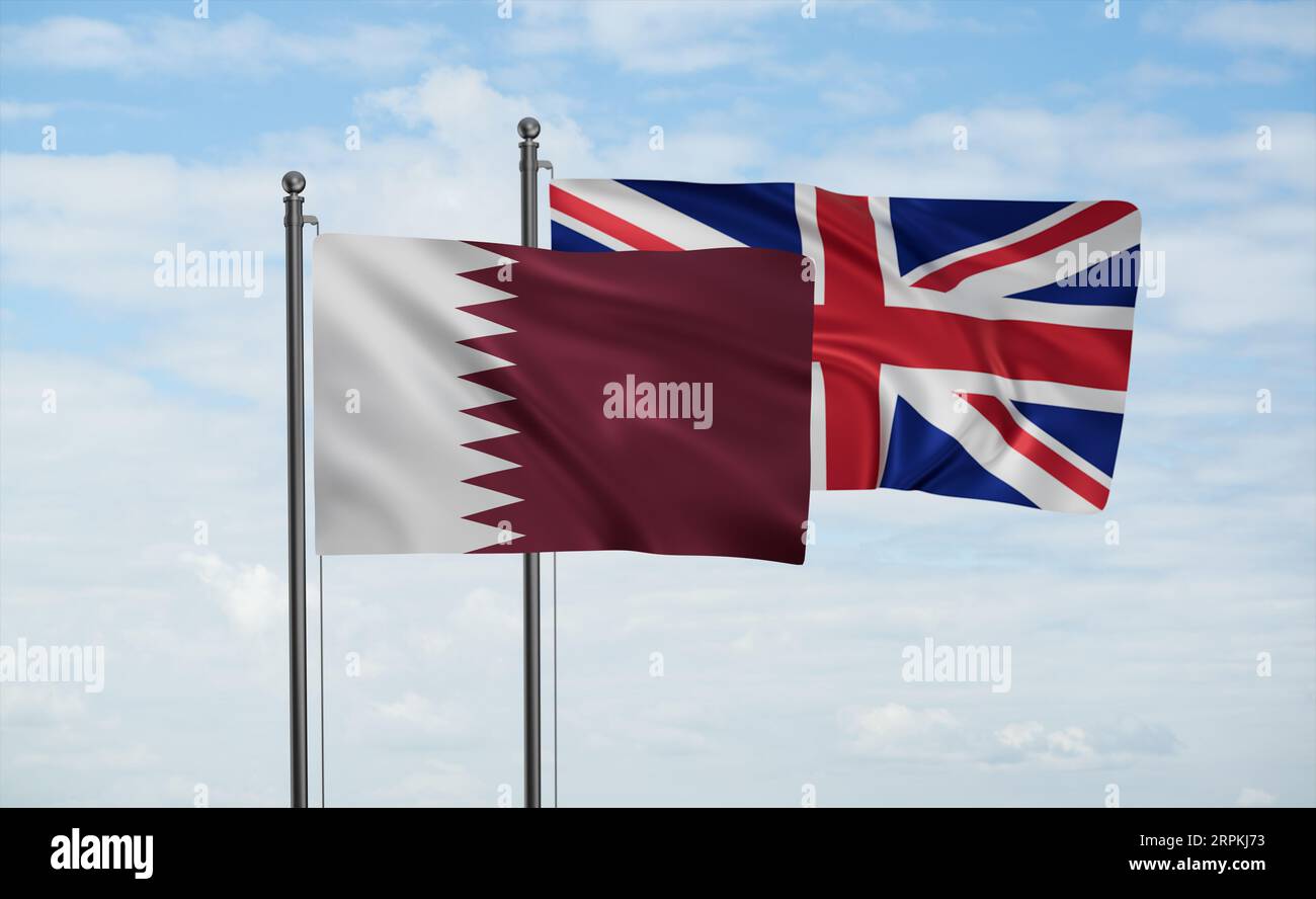 United Kingdom and Qatar flag waving together in the wind on blue sky ...