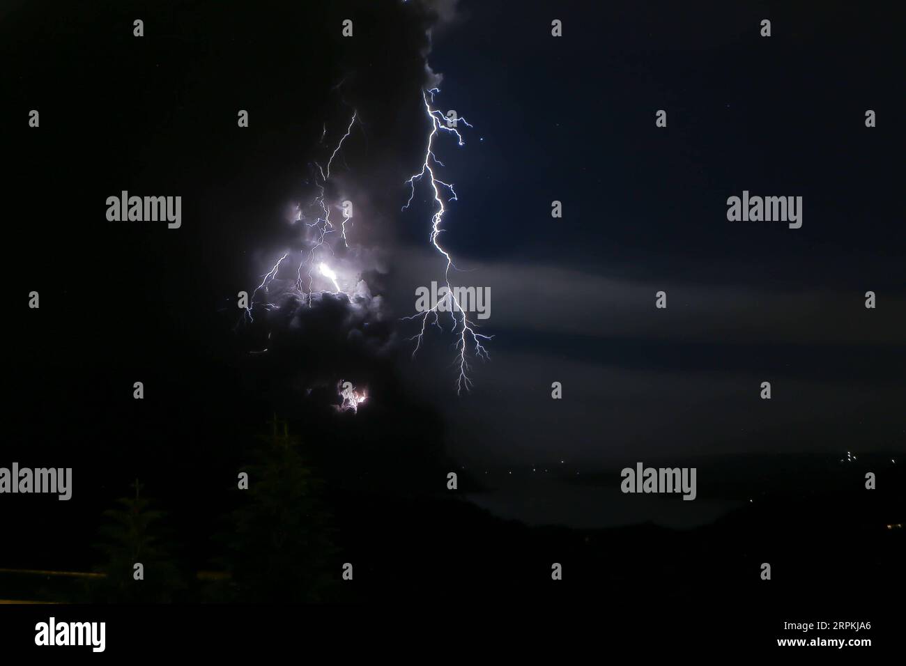 200112 -- BATANGAS, Jan. 12, 2020 -- Volcanic lightning lights up the ...