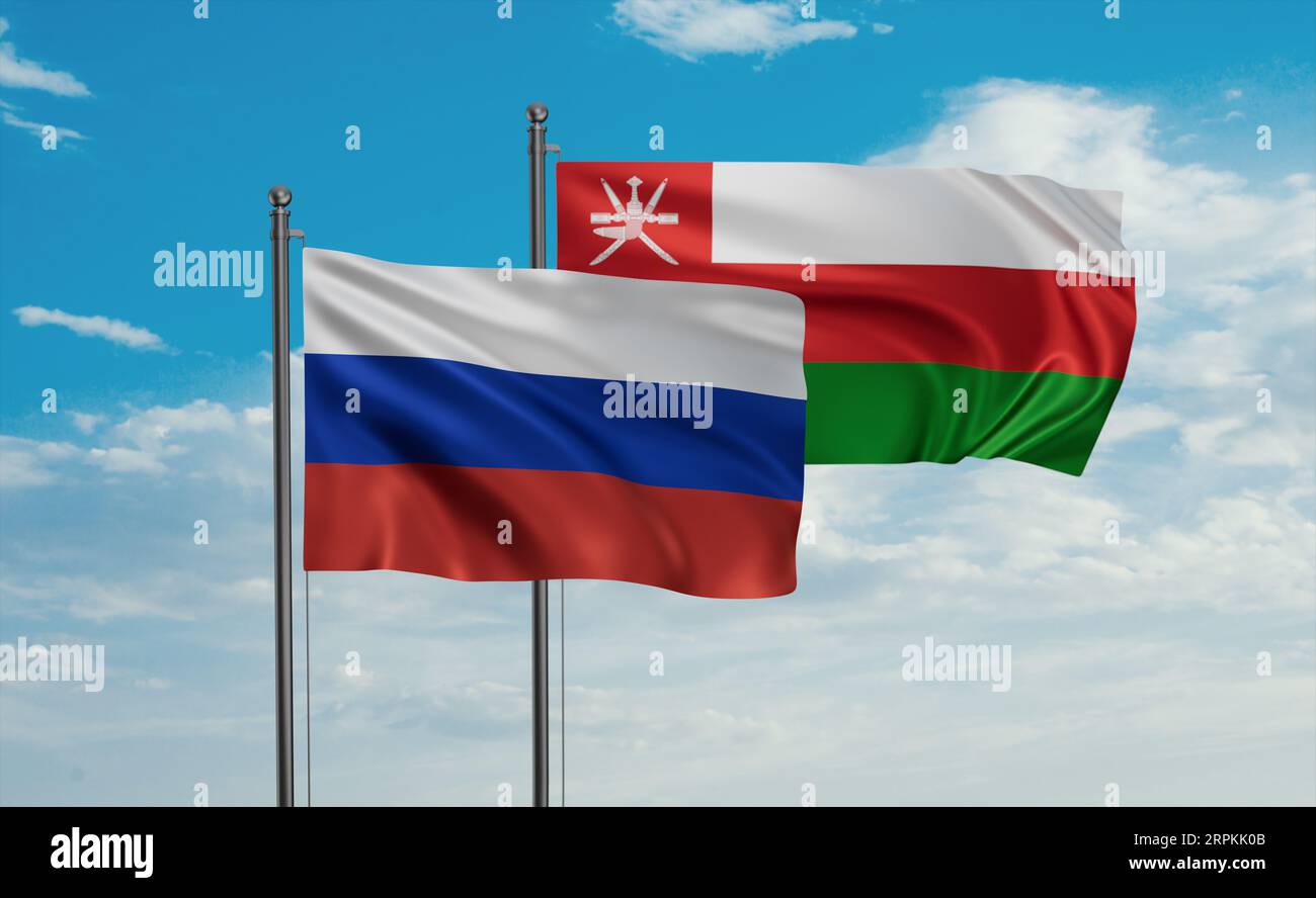 Oman and Russia flag waving together in the wind on blue sky, two ...