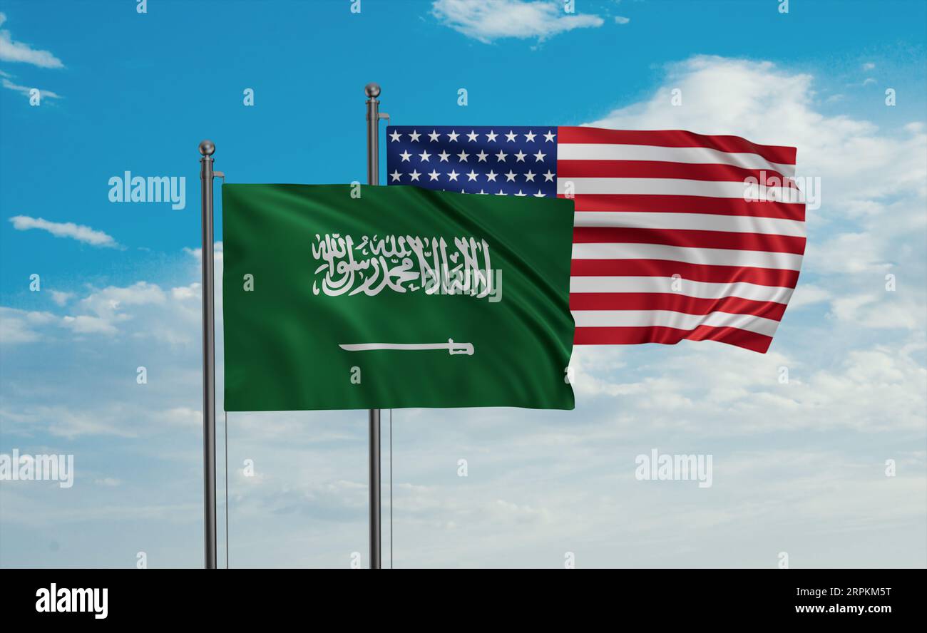 USA and Saudi Arabia, KSA flag waving together in the wind on blue sky ...