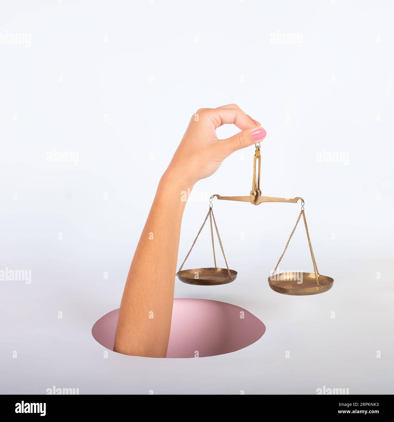 Female hand holding scale justice hi-res stock photography and images ...