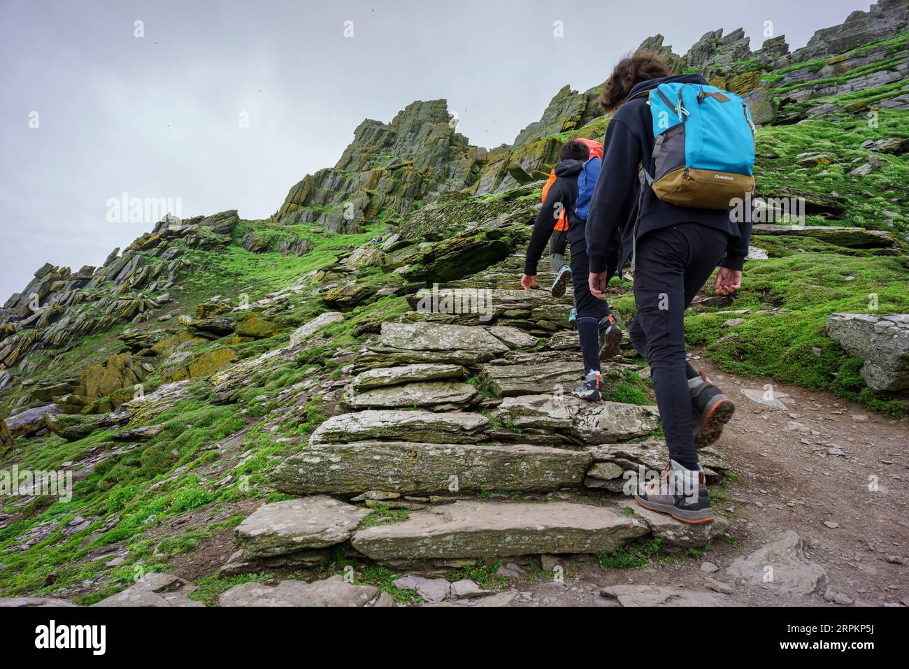 visitors on the steep path up to the monastery, Skellig Michael island ...