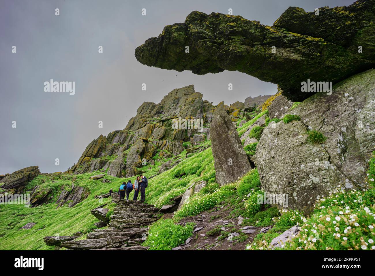 visitors on the steep path up to the monastery, Skellig Michael island ...