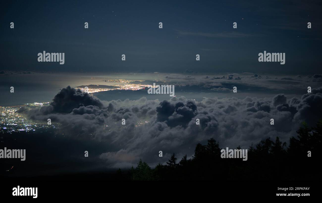 Cloudy moonlit night sky hi-res stock photography and images - Alamy