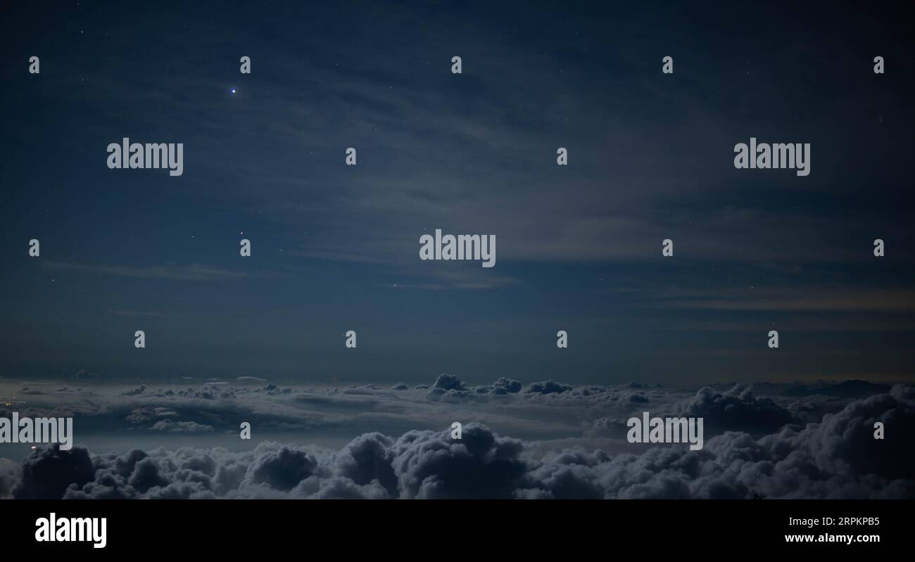 Cloudy moonlit night sky hi-res stock photography and images - Alamy
