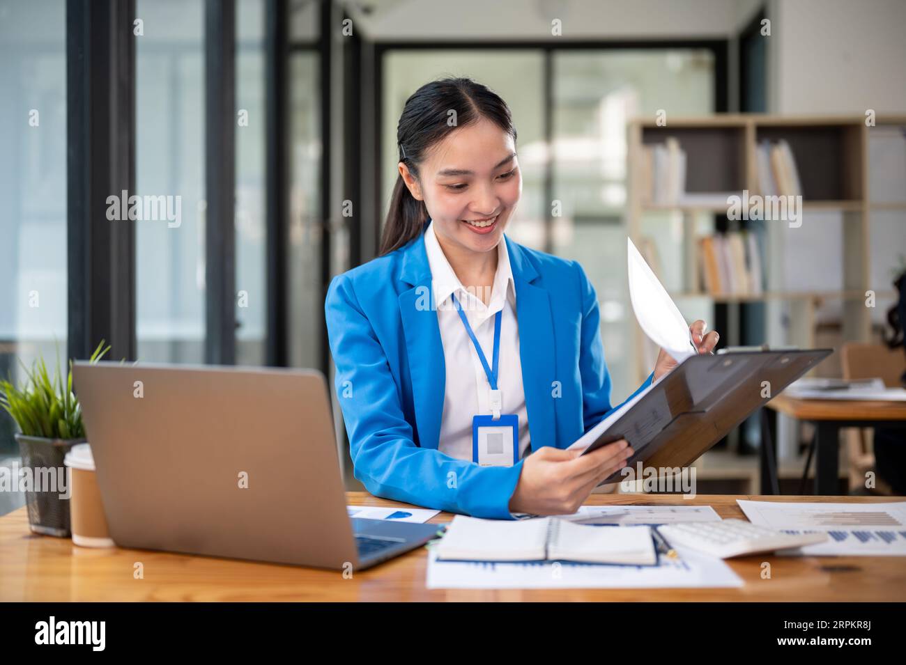 A professional and attractive millennial Asian businesswoman or female ...