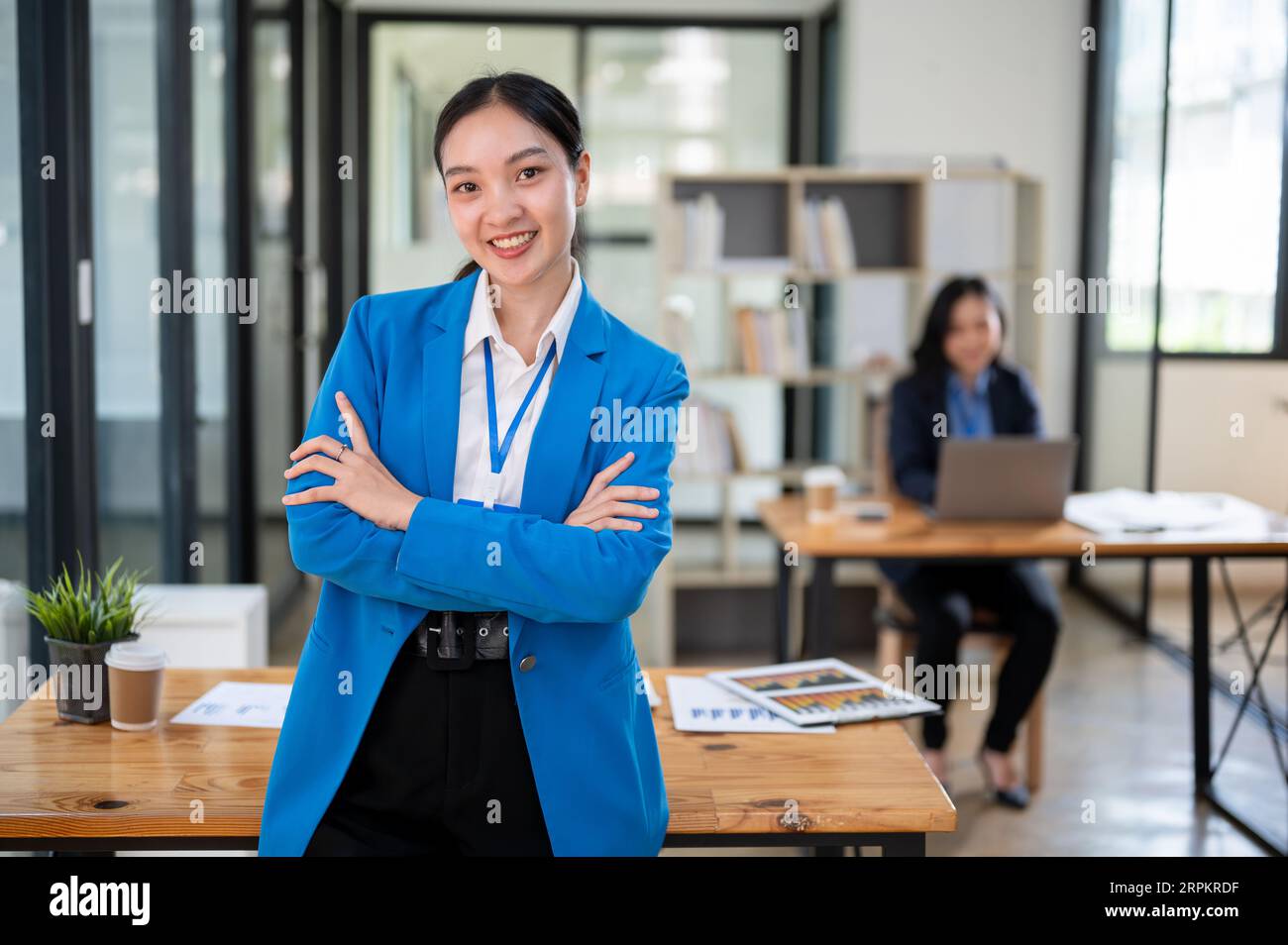 A beautiful and confident millennial Asian businesswoman or female ...