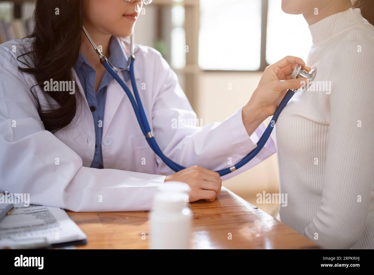 Doctor Listening With Stethoscope