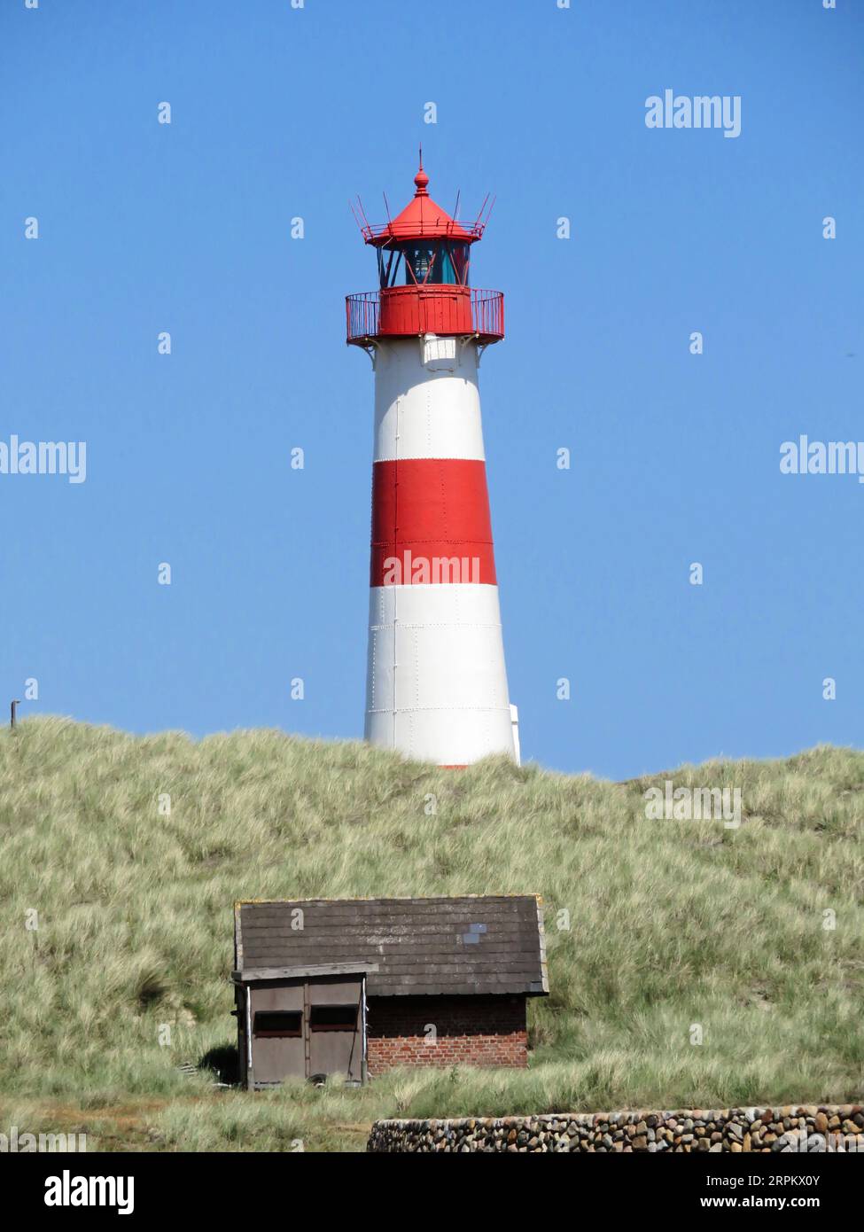 Lighthouse list ost with dune grass hi-res stock photography and images ...