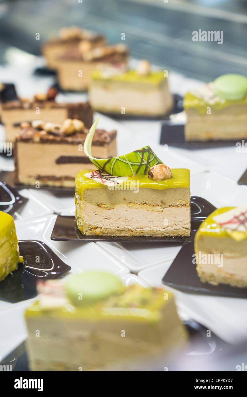 Italian Bakery counter, traditional Sicilian pastry. Fresh cake slices ...