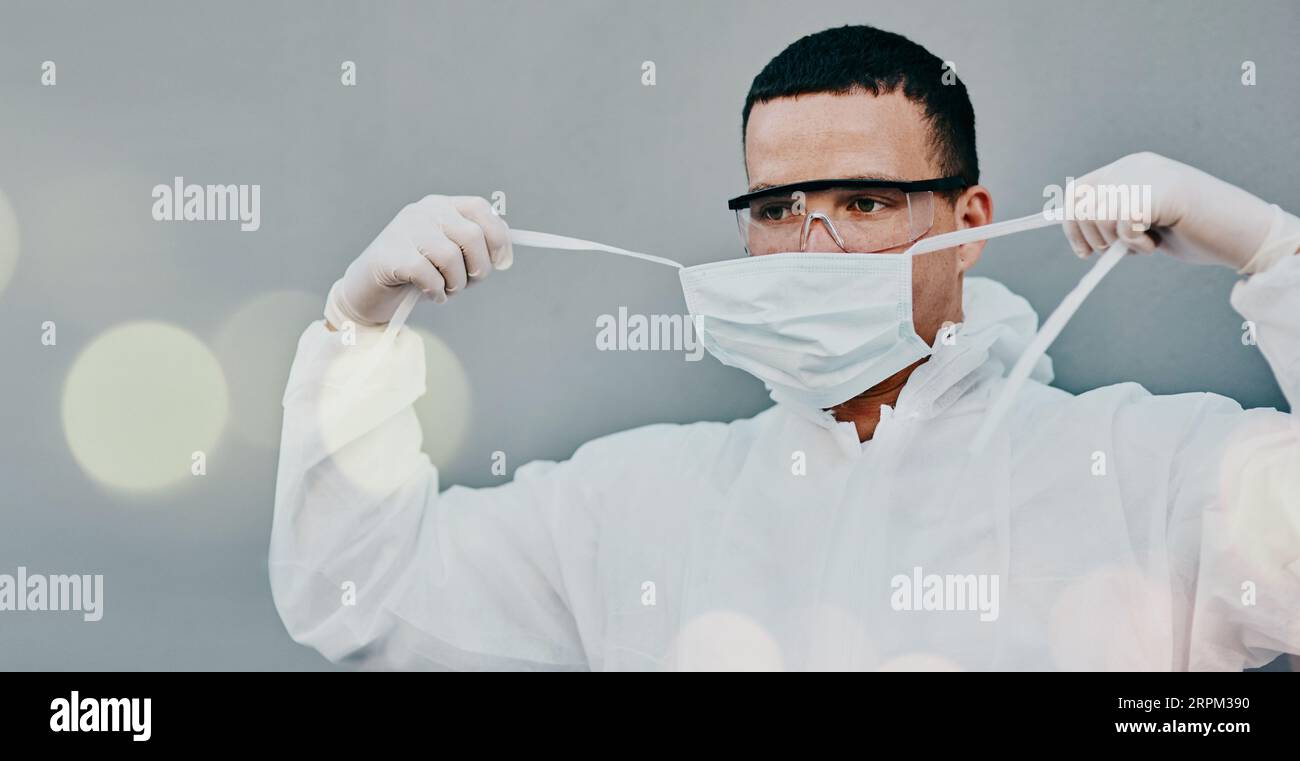 PPE, face mask removal and man in safety suit of lab worker and ...