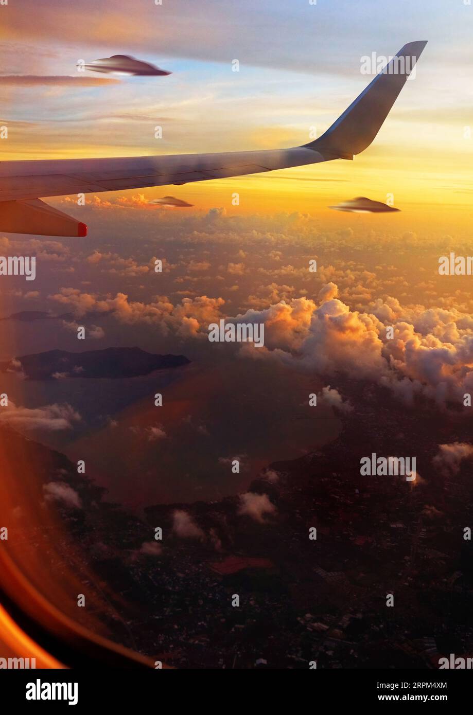 Sci fi, alien and a ufo from the window of a plane flying in the sky ...