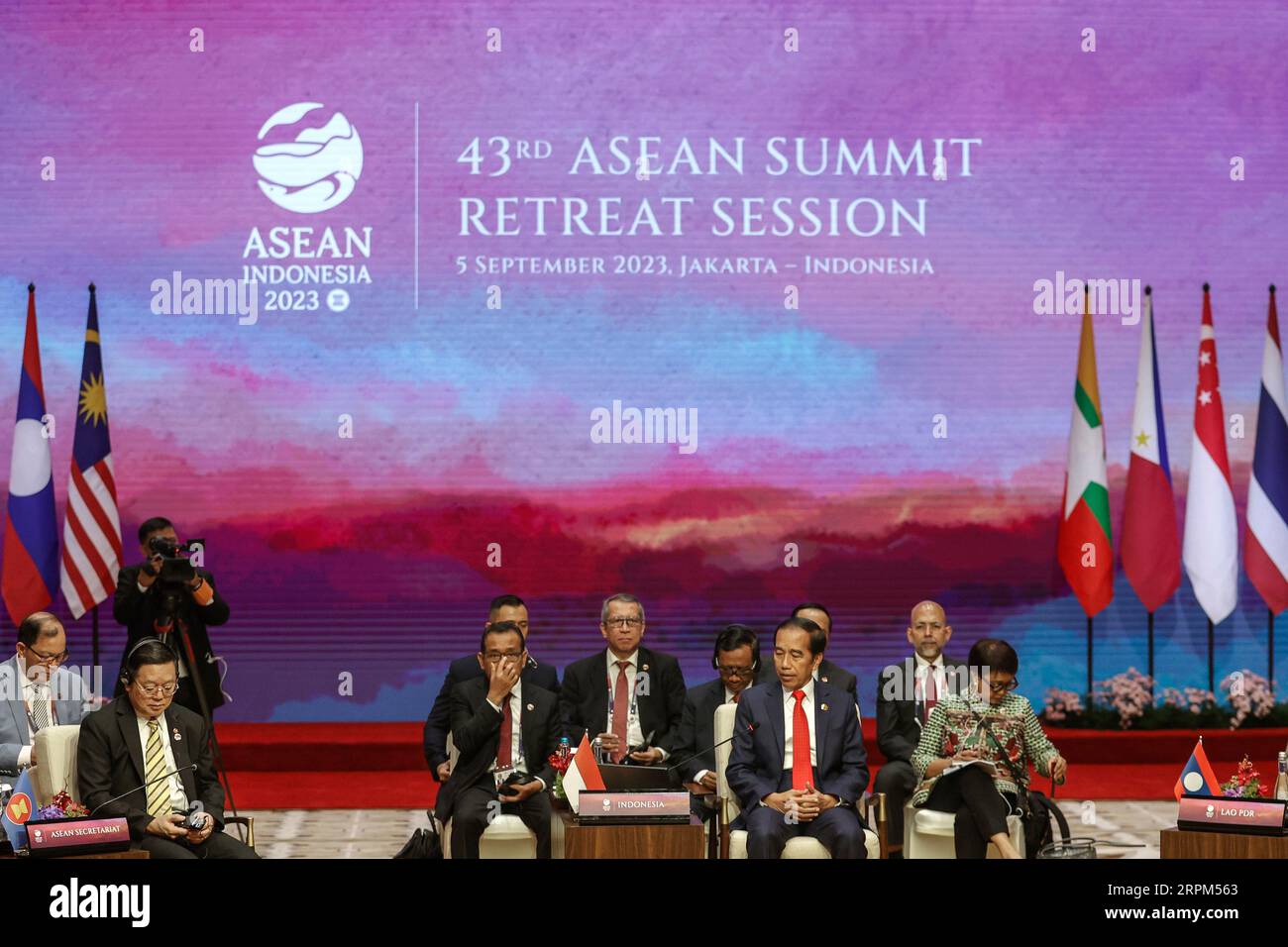 Indonesian President Joko Widodo, second right in front, speaks during ...