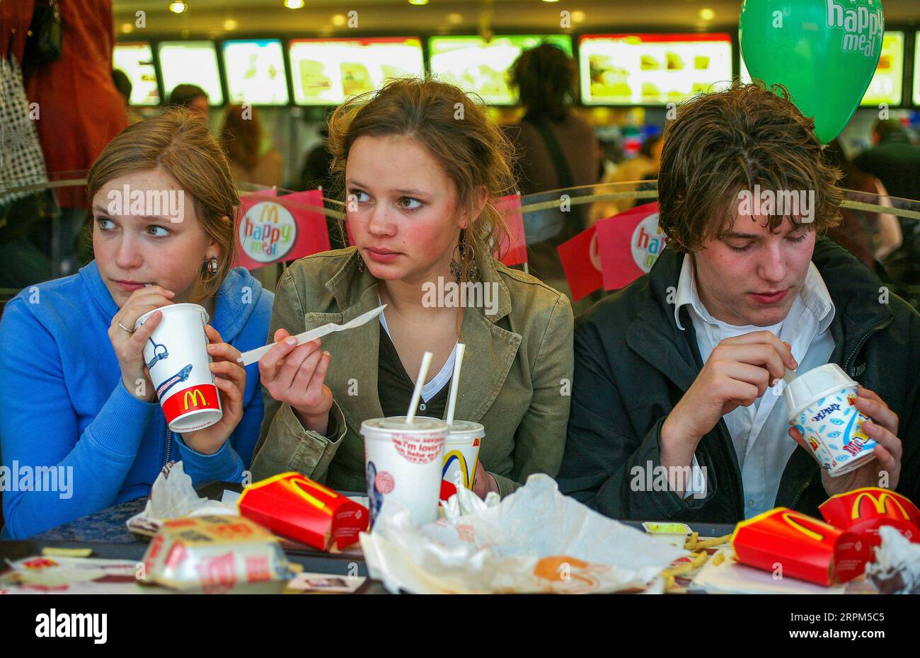 Teenagers eating at Mc Donald's during their lunchbreak, Arnhem ...