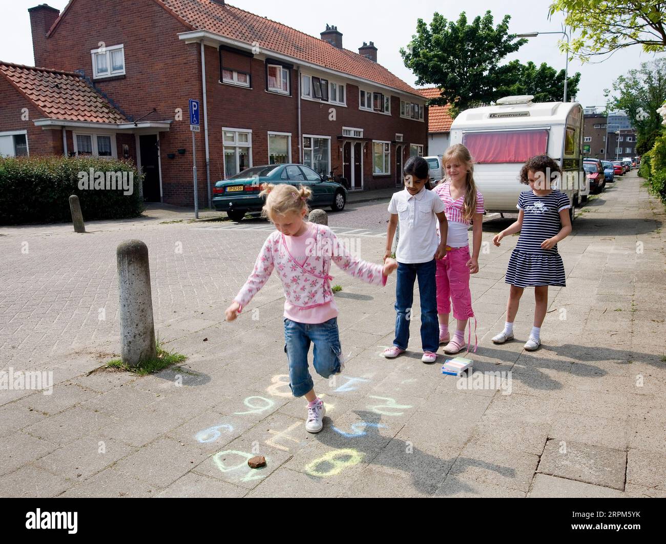 Netherlands, Arnhem, girls are playing hopscotch Stock Photo - Alamy