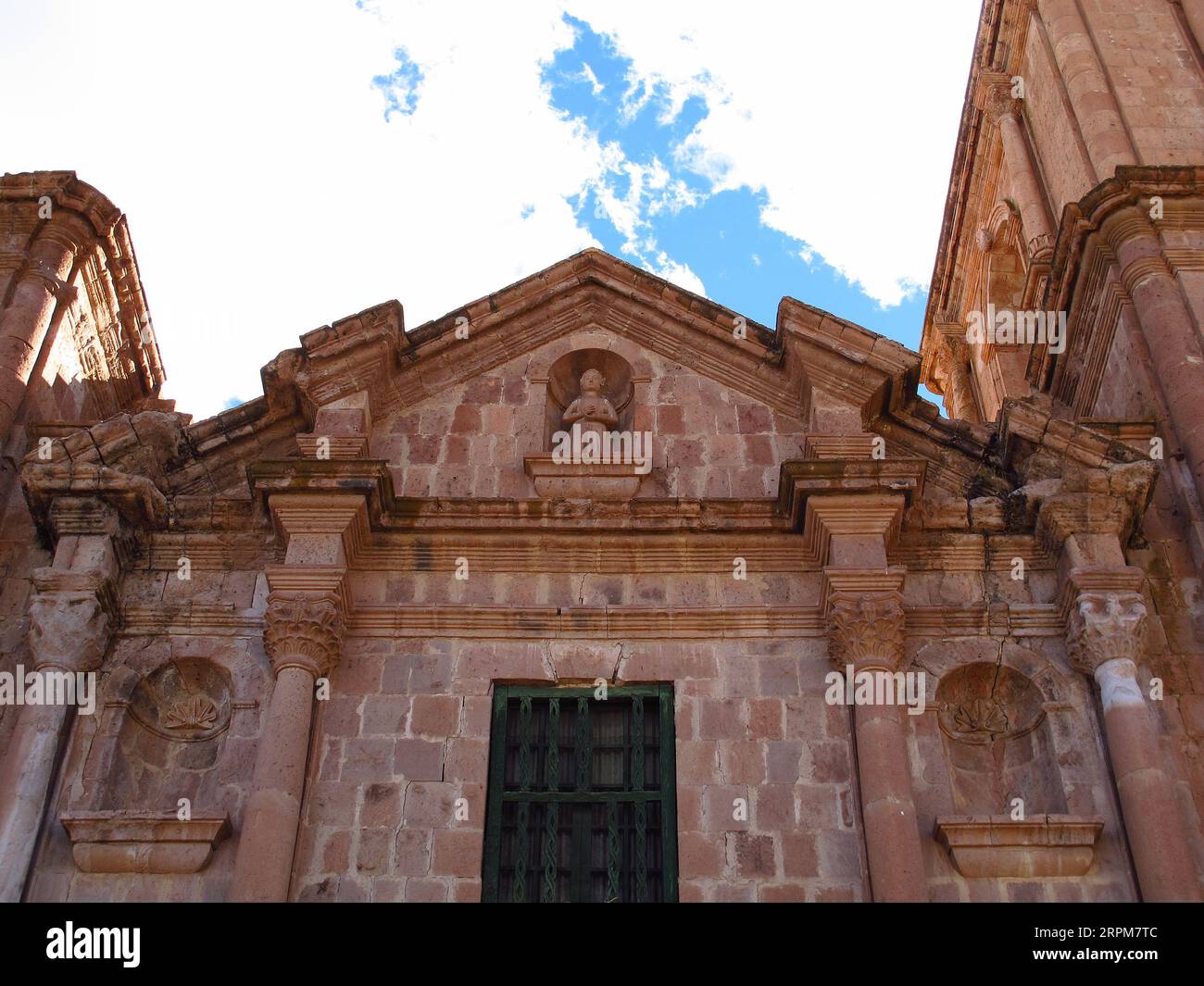The ancient church in the small city on Altiplano, Peru, South America ...
