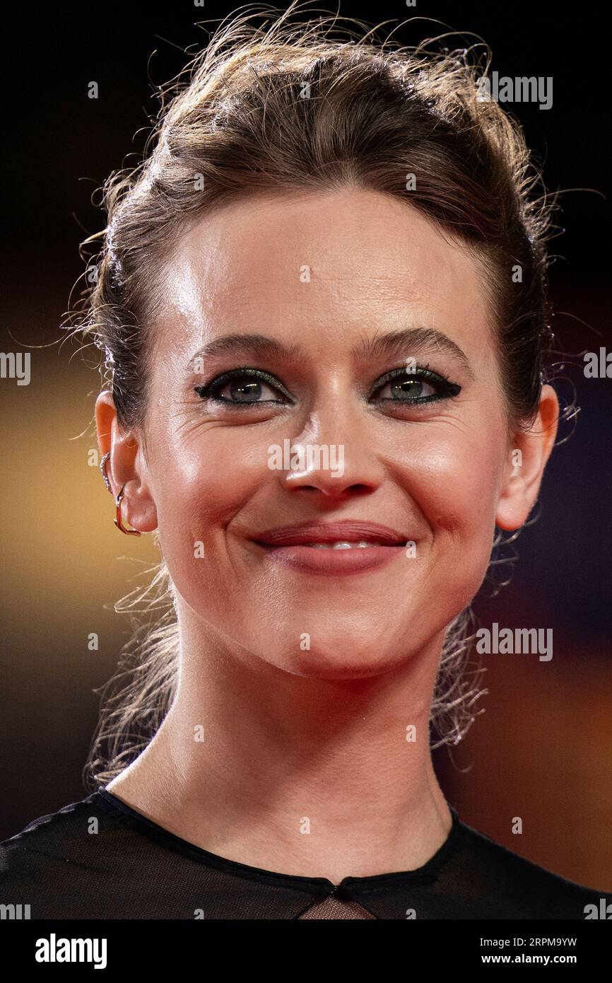 Lou de Laage poses for photographers upon arrival for the premiere of ...