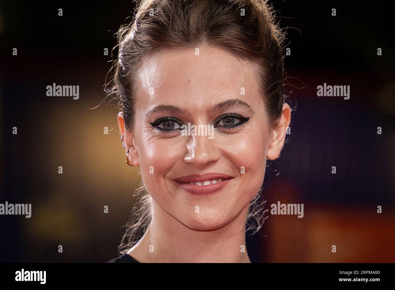 Lou de Laage poses for photographers upon arrival for the premiere of ...