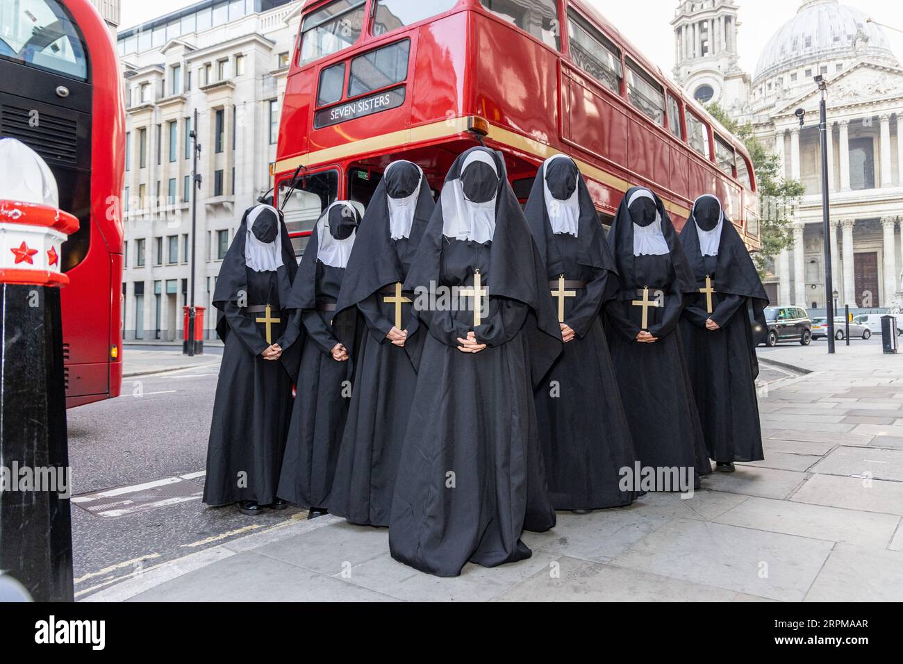 Seven demonic nuns descend on London's Millennium Bridge to celebrate ...