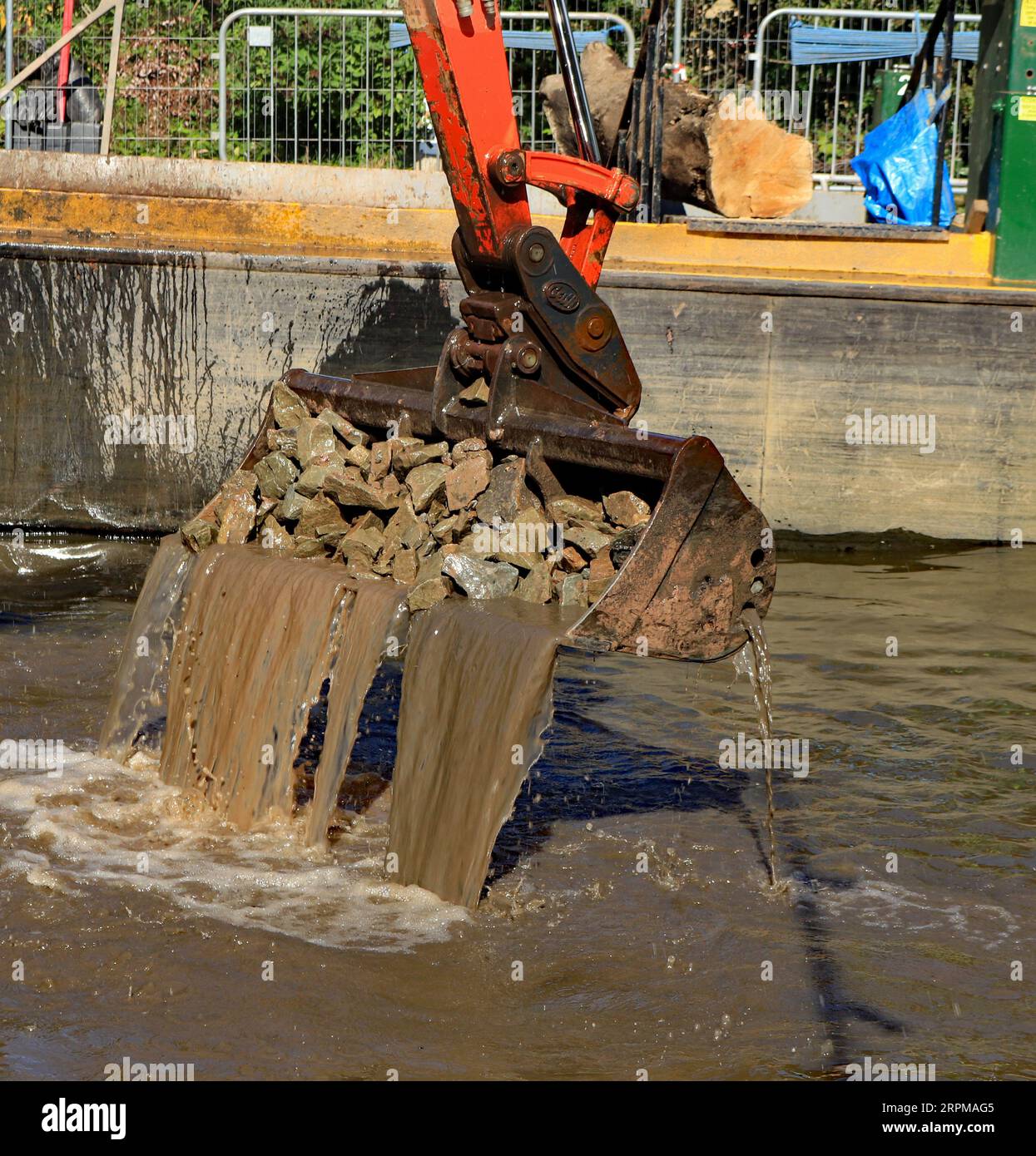 Water flowing from an excavator bucket hi-res stock photography and ...