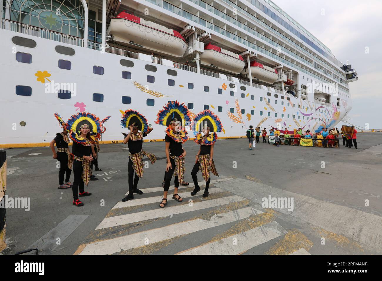 Philippine fiesta-themed welcome celebration for cruise ship at Manila ...