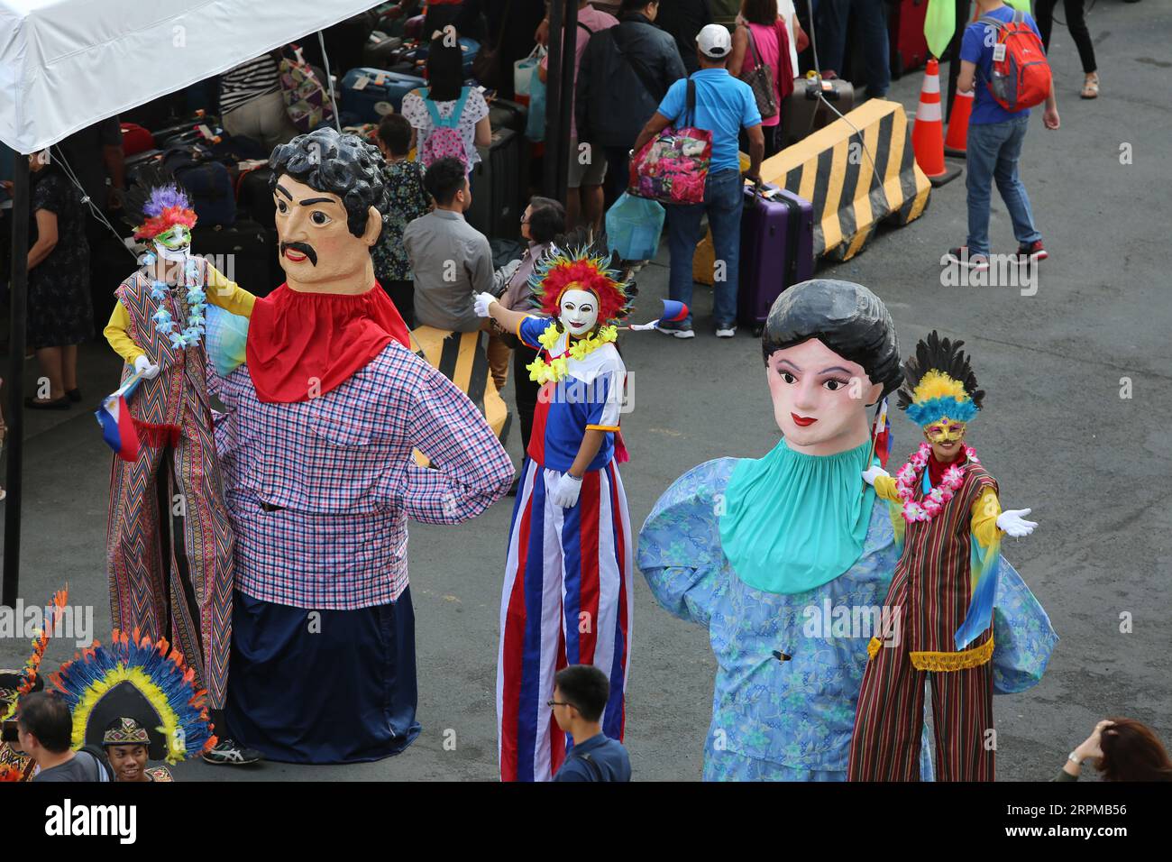 Philippine fiesta-themed welcome celebration for cruise ship at Manila ...