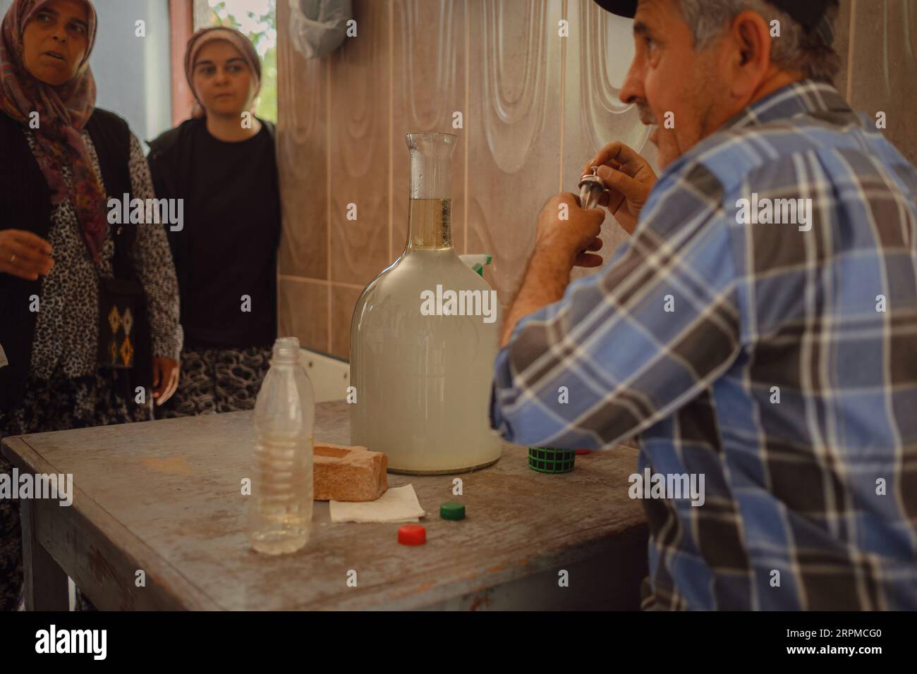 Isparta, Turkey - June 6, 2022: all stages of rose oil distillation ...