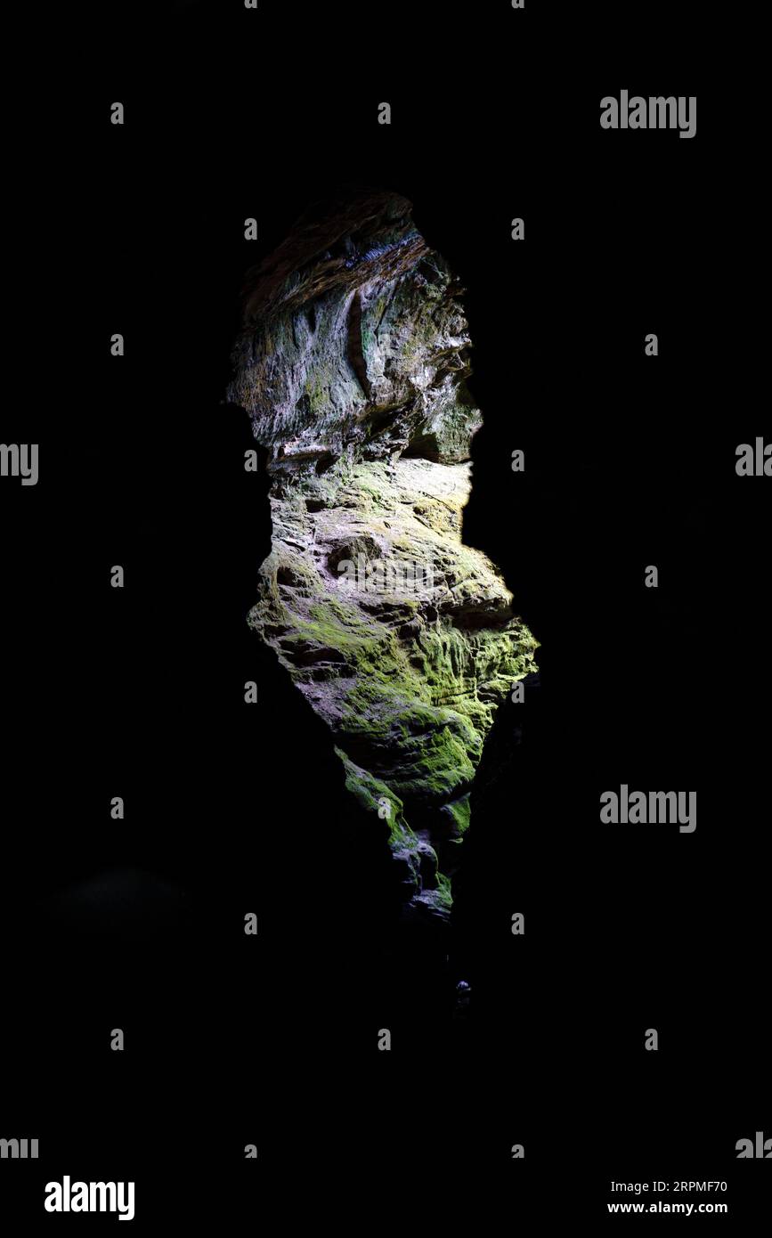 Emerging from a Cave into the Light Stock Photo - Alamy