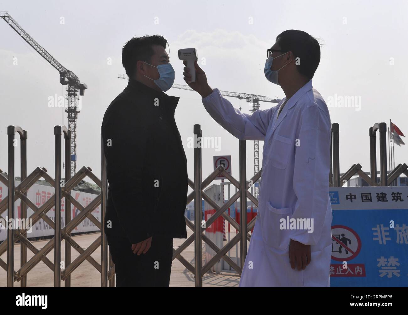 200211 -- CHENGDU, Feb. 11, 2020 -- An epidemic prevention staff member ...