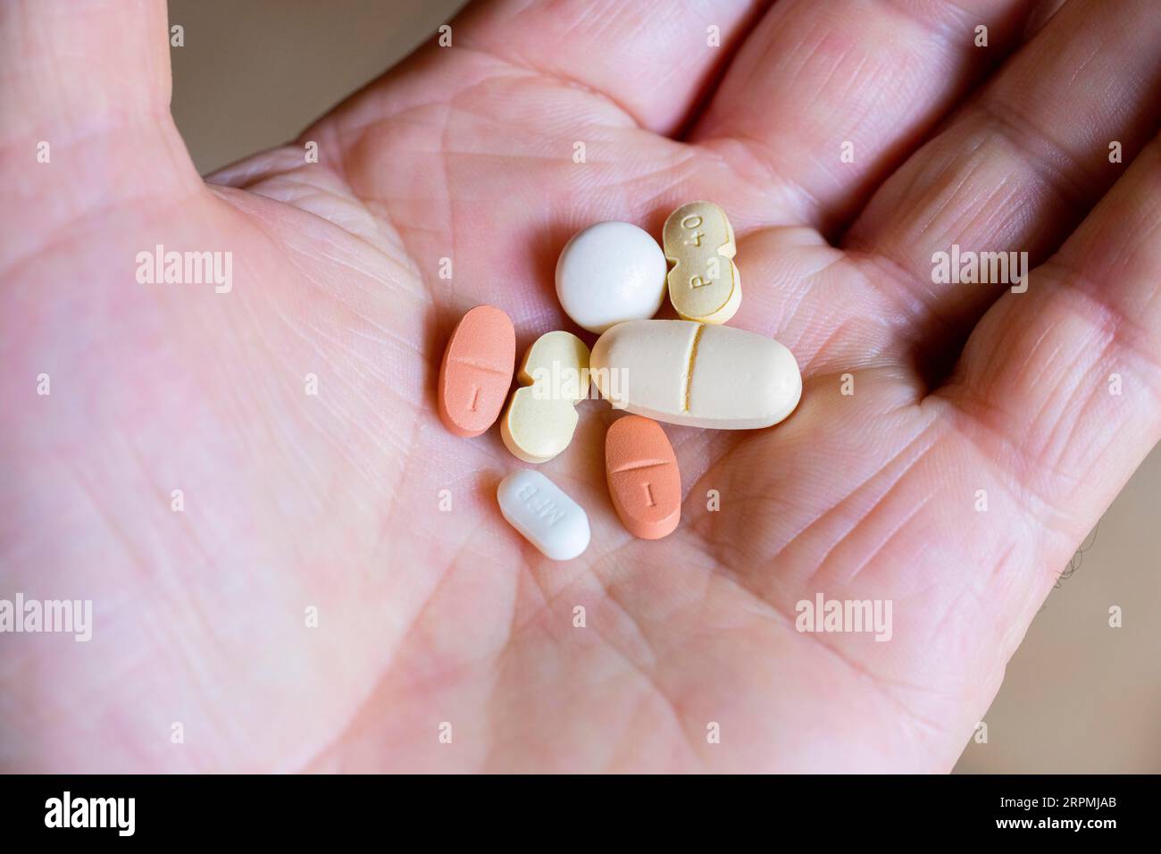 Hand holding medical drugs hi-res stock photography and images - Alamy