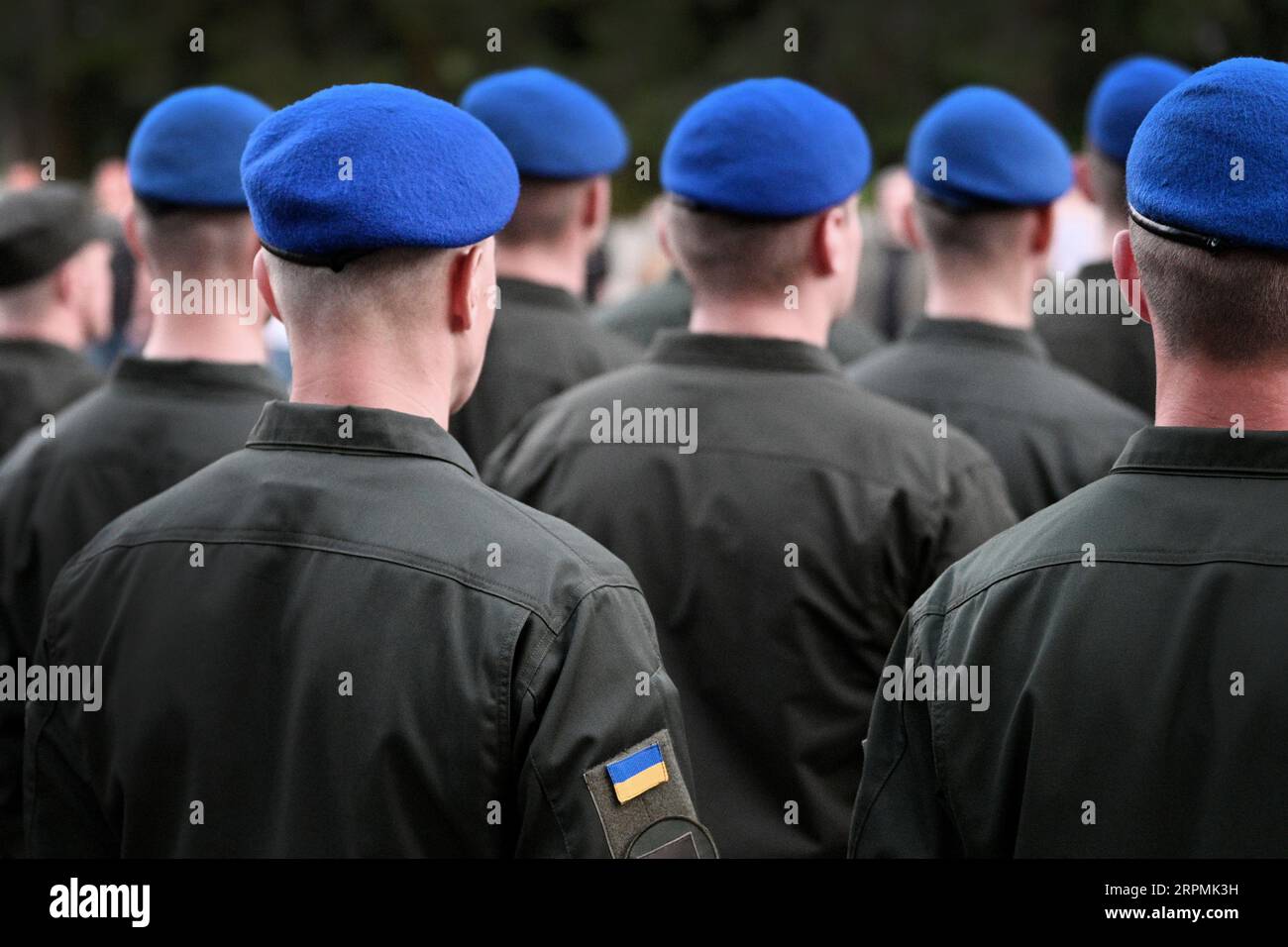 Ukrainian soldiers. Ukrainian army. Ukrainian flag on military uniform ...