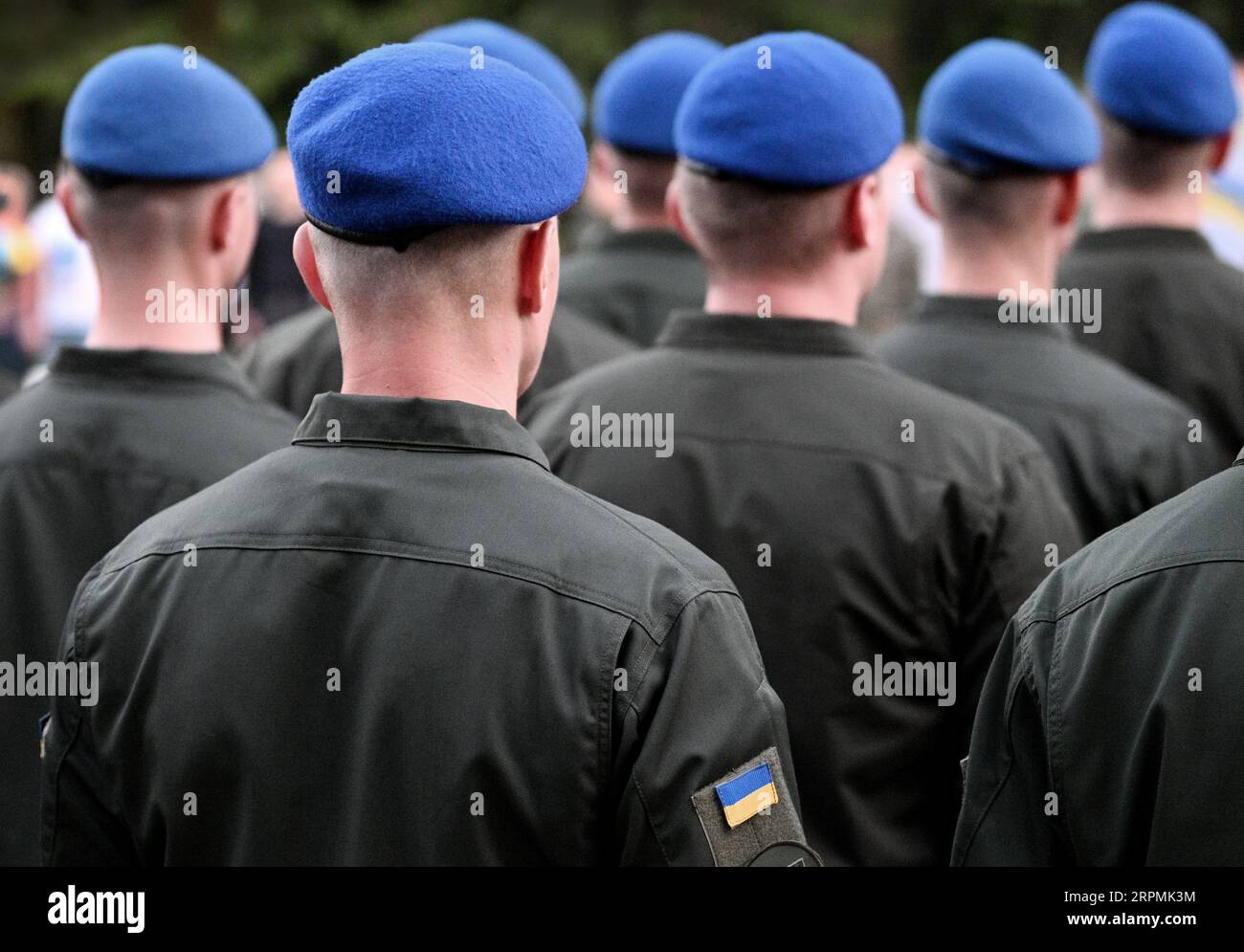Ukrainian soldiers. Ukrainian army. Ukrainian flag on military uniform ...