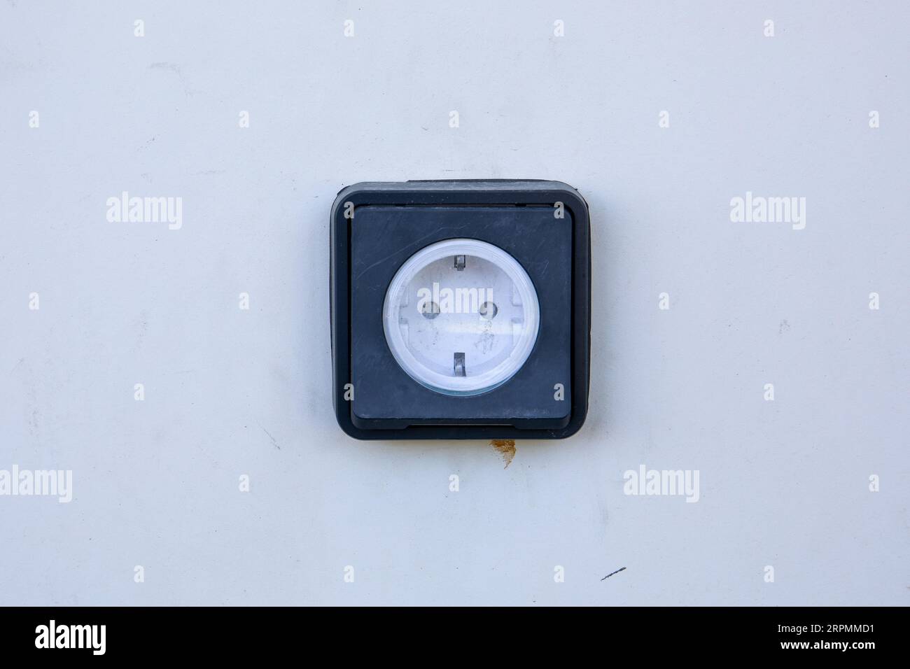 White dirty building facade with outdoor electrical outlet Stock Photo ...