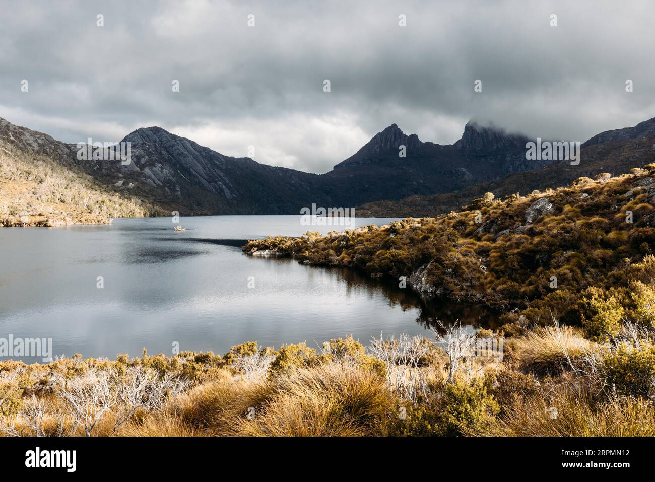 Dove Lake and Cradle Mountain on a cool stormy spring afternoon near ...