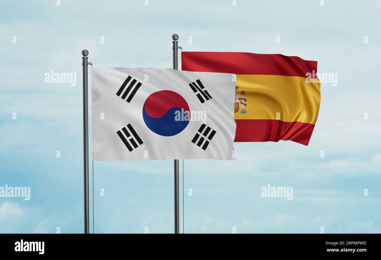 Spain and South Korea flag waving together in the wind on blue sky, two ...