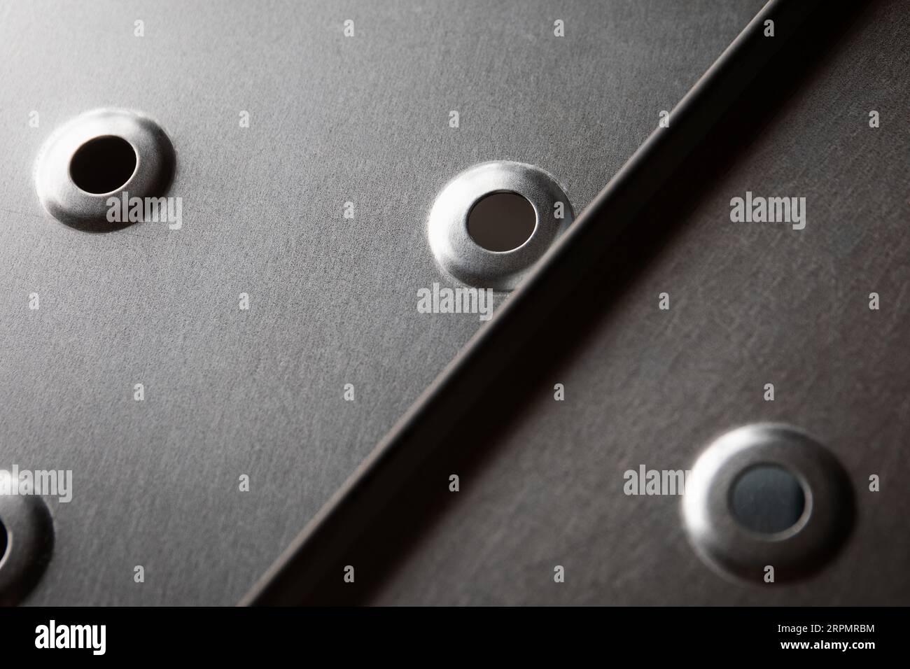 Galvanized metal plate surface with holes. Industrial constructions ...