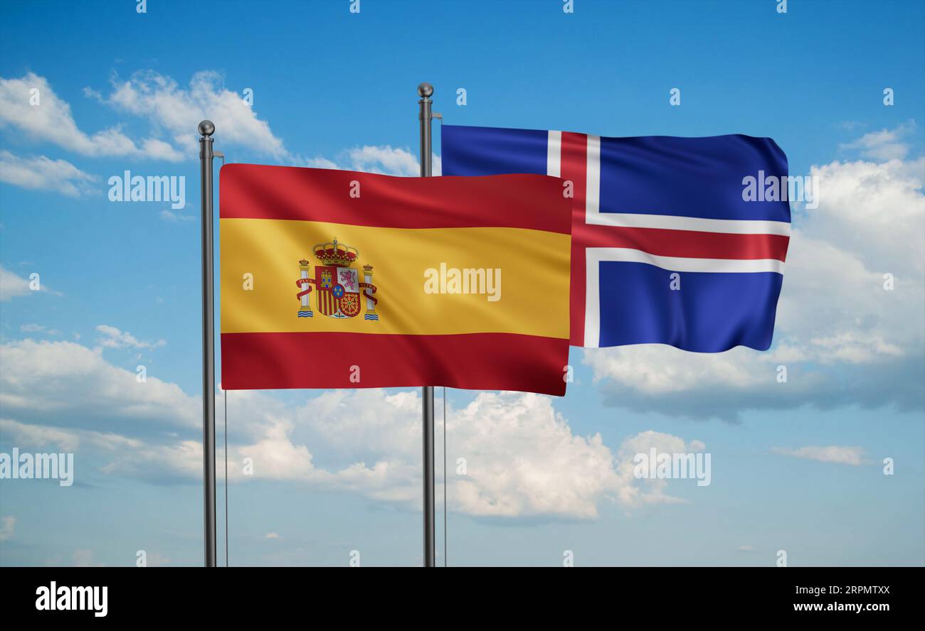 Iceland and Spain flag waving together in the wind on blue sky, two ...