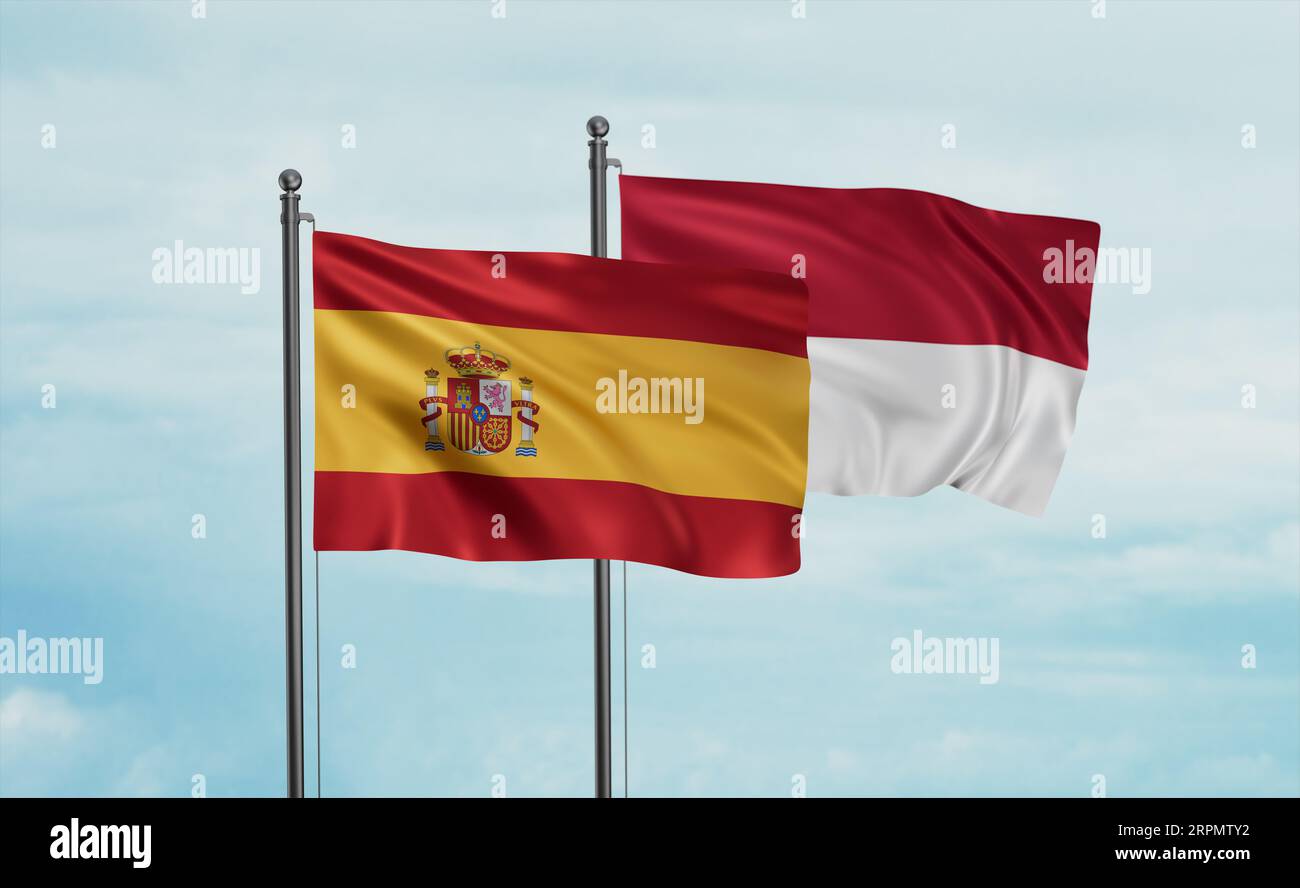 Indonesia flag and Spain flag waving together on blue sky, two country ...