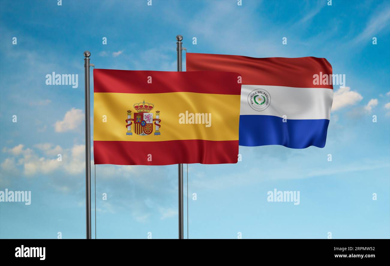 Paraguay flag and Spain flag waving together on blue sky, two country ...