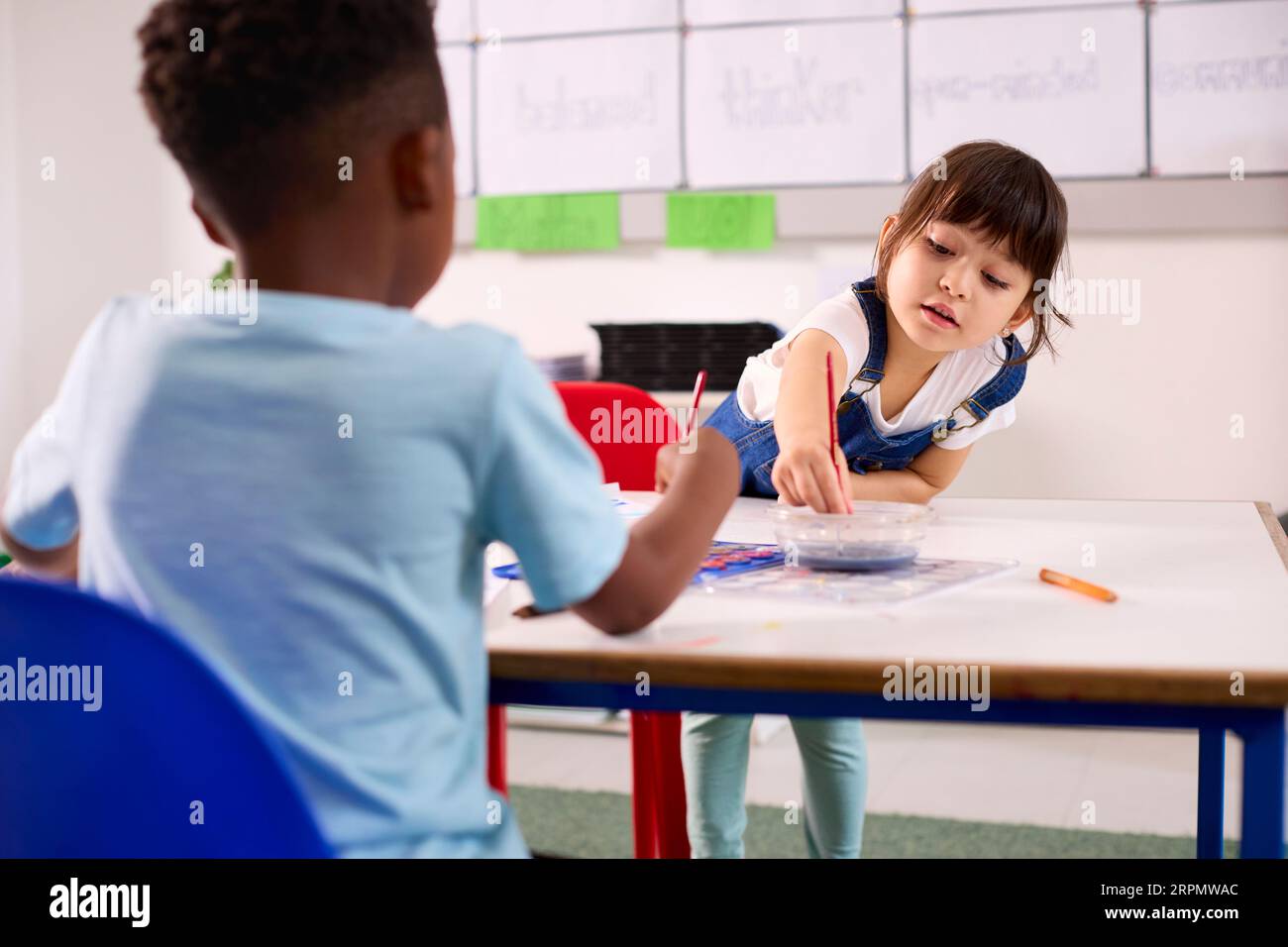 Multi-Cultural Elementary School Pupils In Art Class At School Stock ...