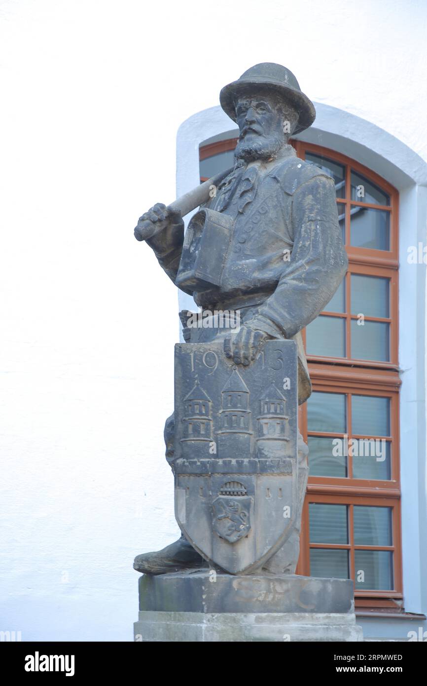 Miner figure with city coat of arms, symbol for historical mining ...